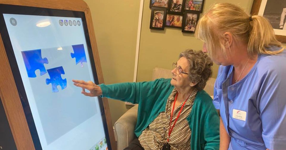 MHA Stones Place purchases ‘tiny tablet’ for residents to enjoy group ...